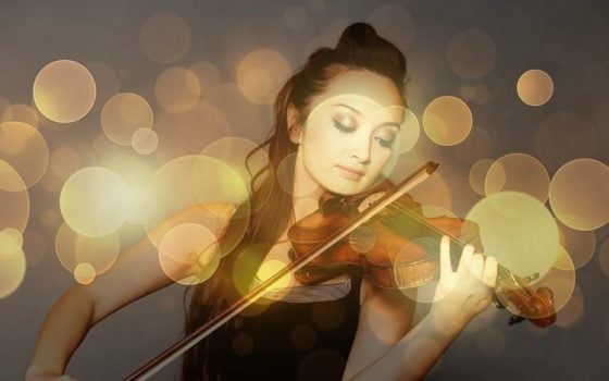 Solos Twice as Common in Sad Songs - Neuroscience News